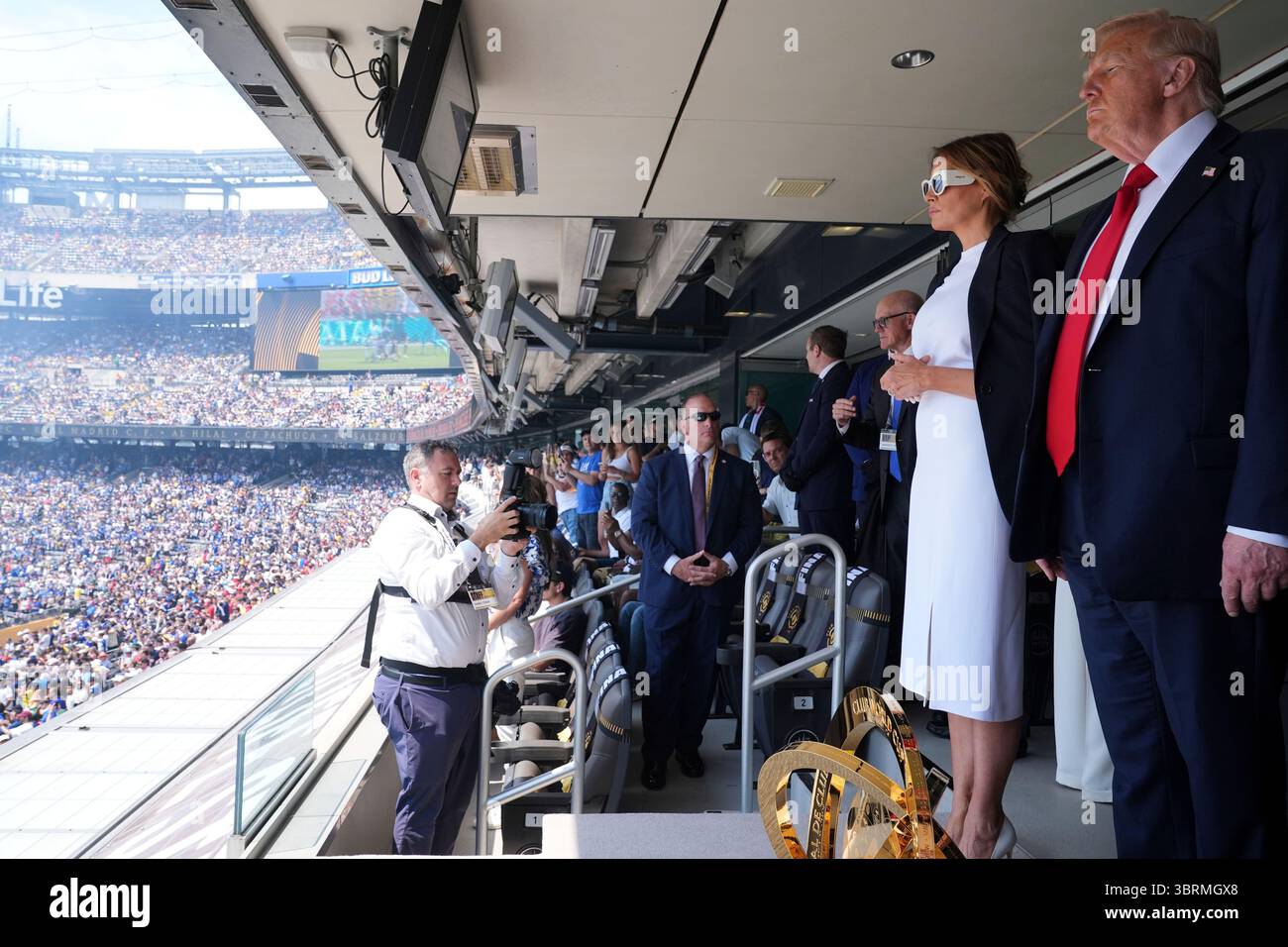 President Donald Trump, right, and first lady Melania Trump attend the ...