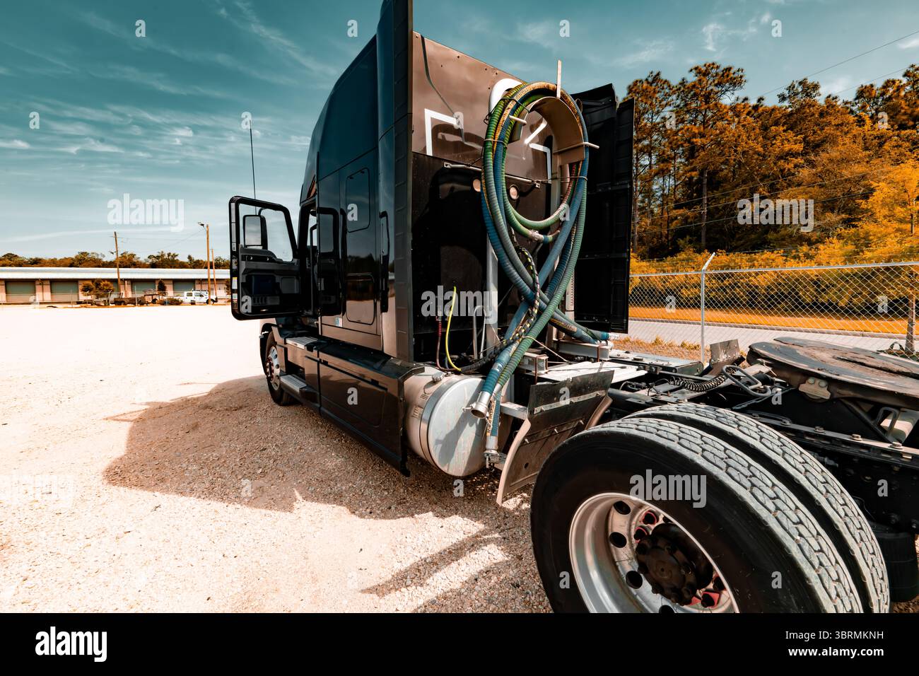 Powerful 18-wheeler semi truck parked and ready for the road. Heavy ...