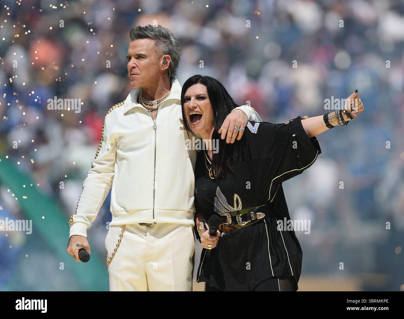 New Jersey, USA, 13th July 2025. Robbie Williams and Laura Pausini sing ...