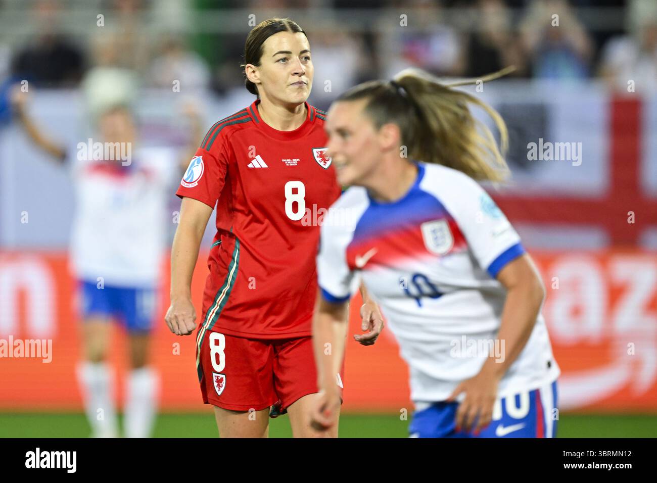 Wales's Angharad Jane James, left, reacts as England's Ella Toone ...