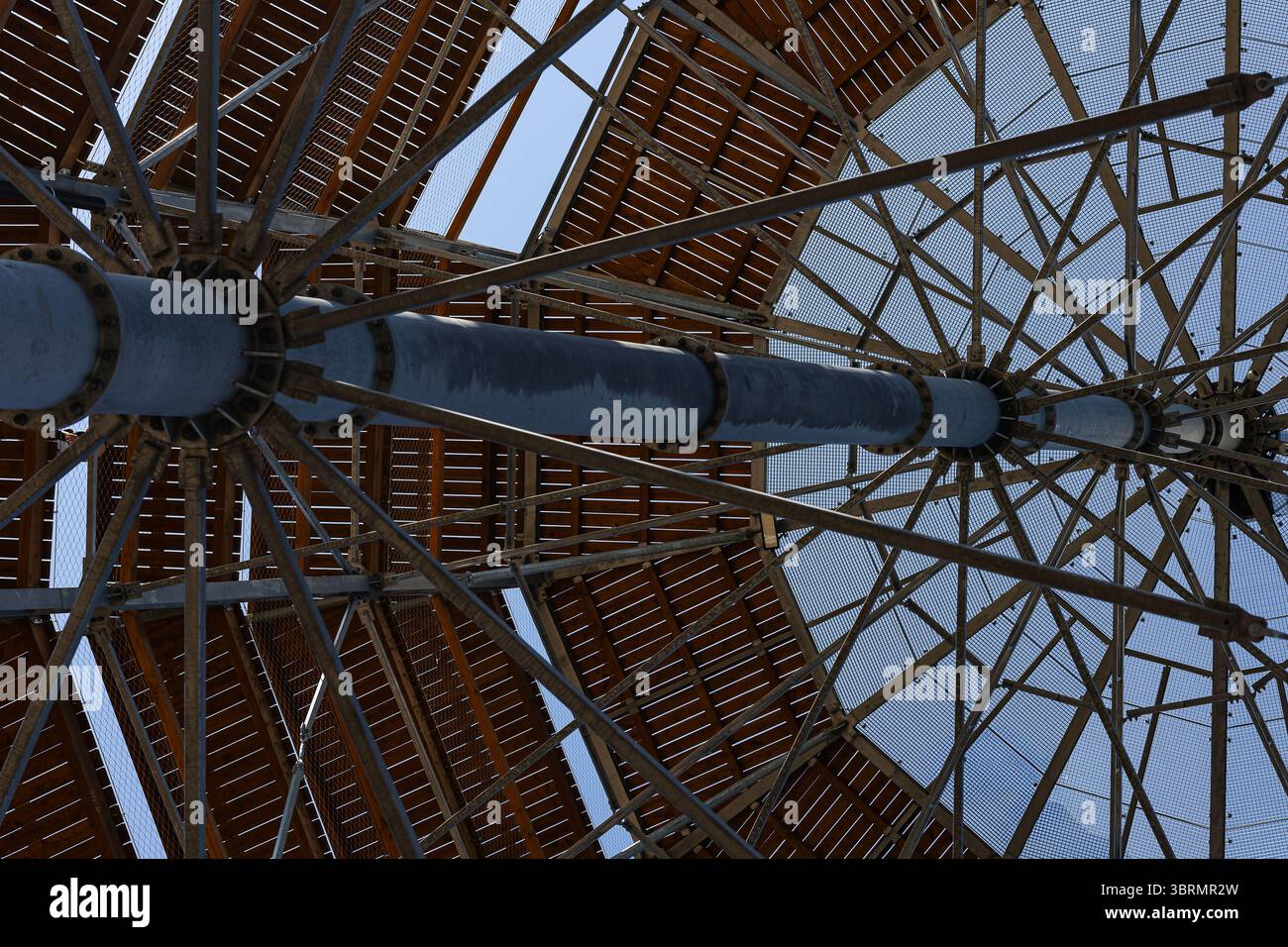 Steel construction of observation tower with radial metal beams and ...
