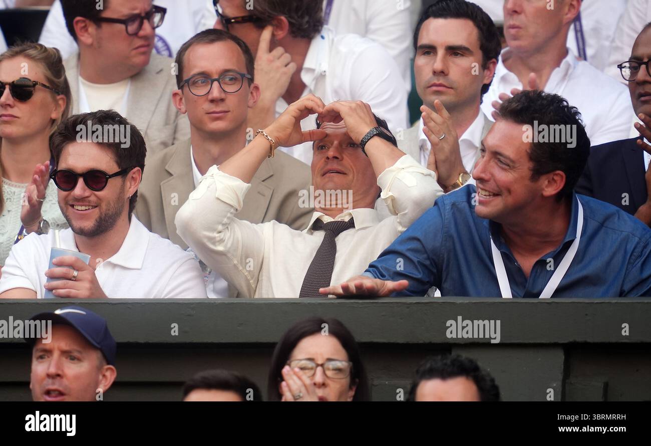 Niall Horan (left) alongside Orlando Bloom (centre) on day fourteen of ...