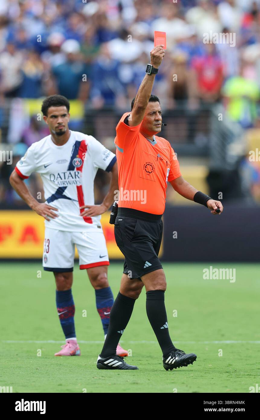New Jersey, USA. 13th July, 2025. Referee Alireza Faghani issues a red ...