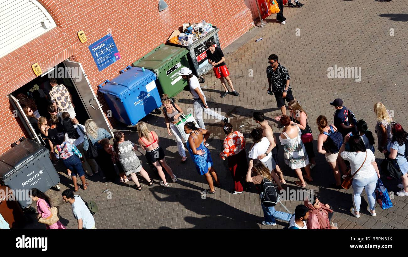 People queue to use a public toilet in Brighton, UK Stock Photo - Alamy
