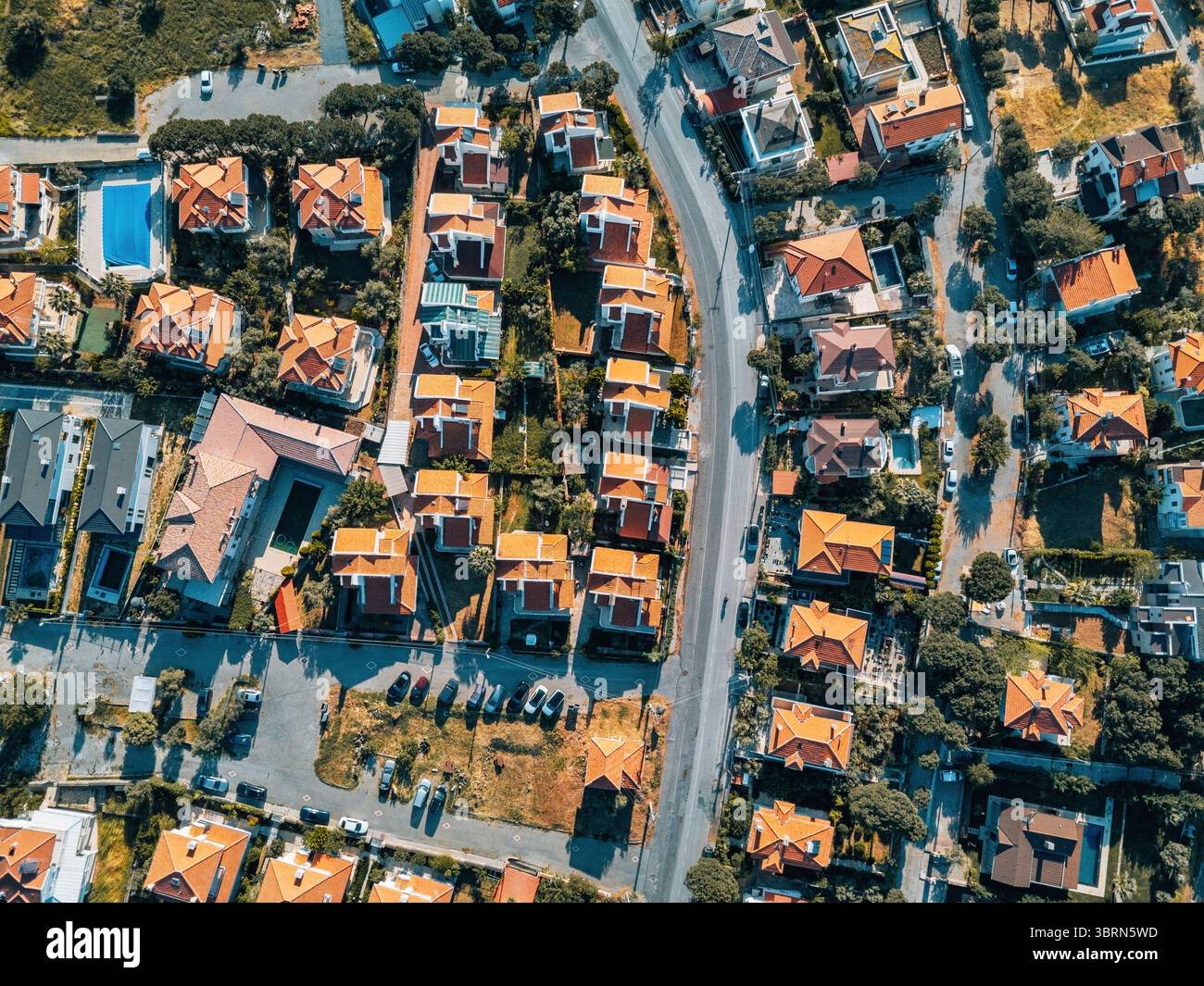Drone capturing an aerial view of a residential neighborhood ...