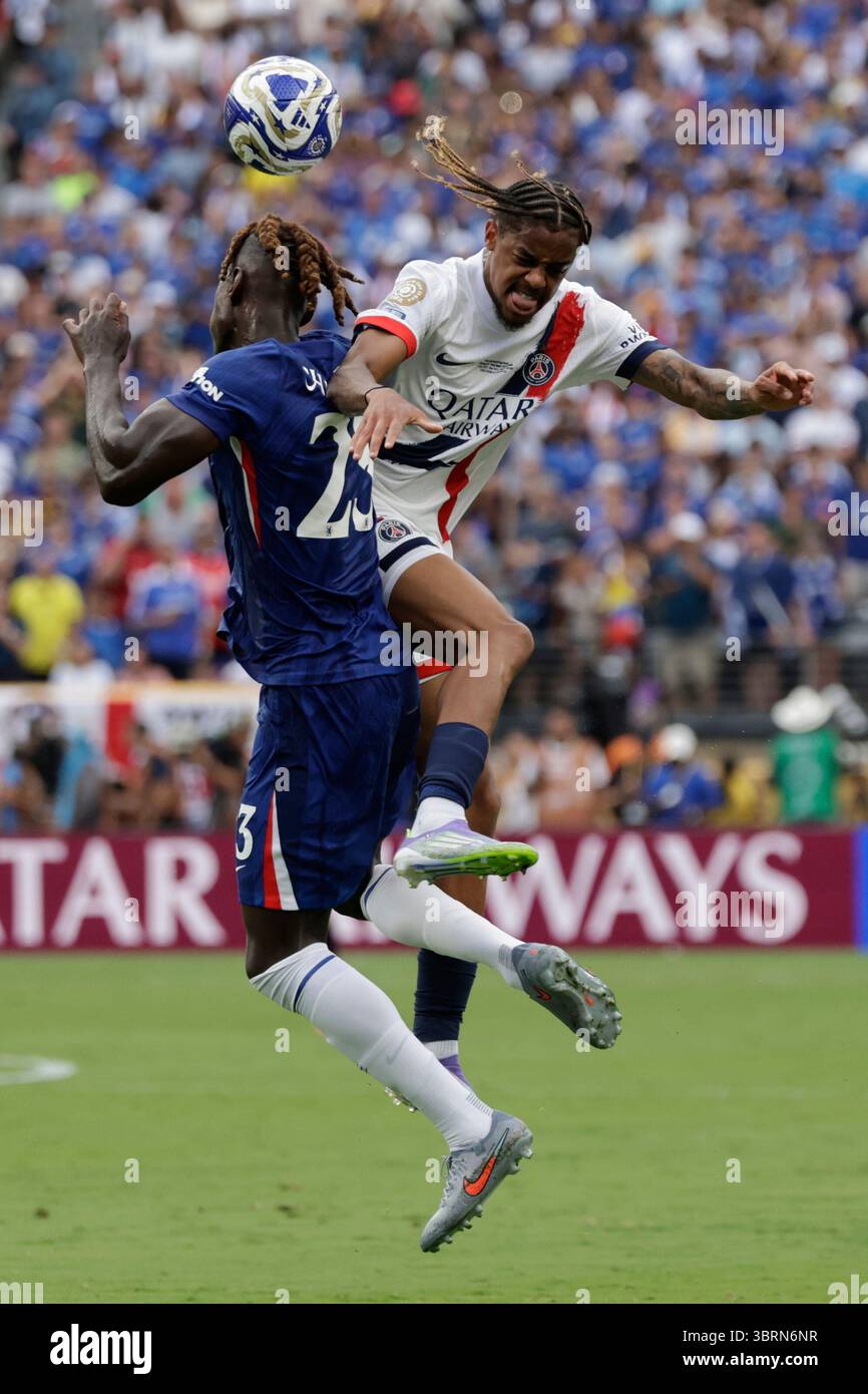 Paris Saint-Germain's Bradley Barcola, right, and Chelsea's Trevoh ...