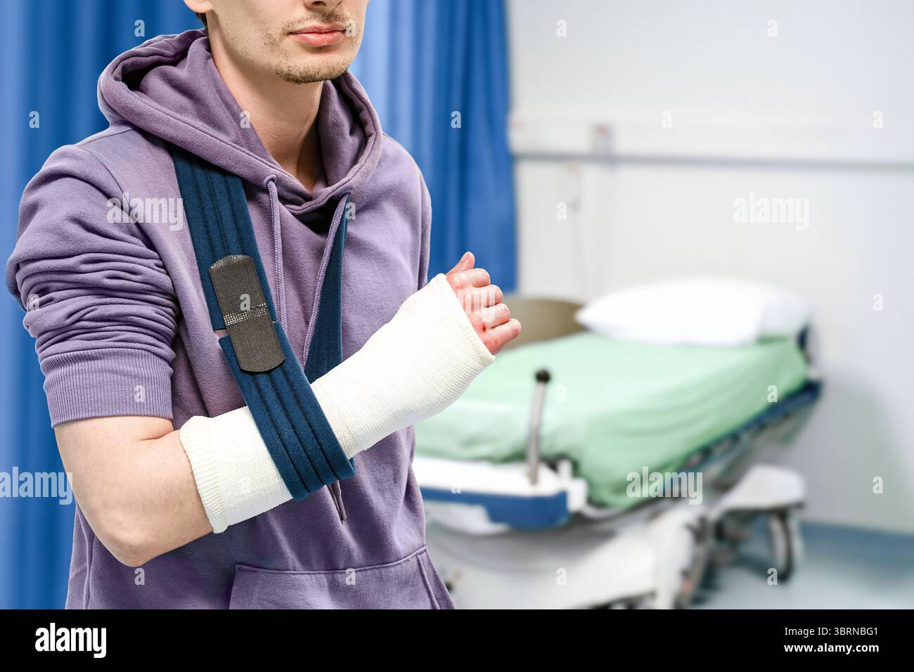 Closeup man with broken arm in cast and orthopedic sling Stock Photo ...