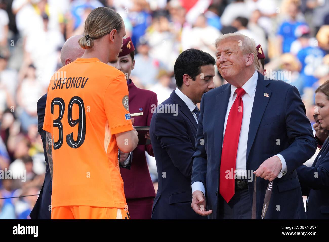 President Donald Trump, right, speaks with PSG's goalkeeper Matvey ...