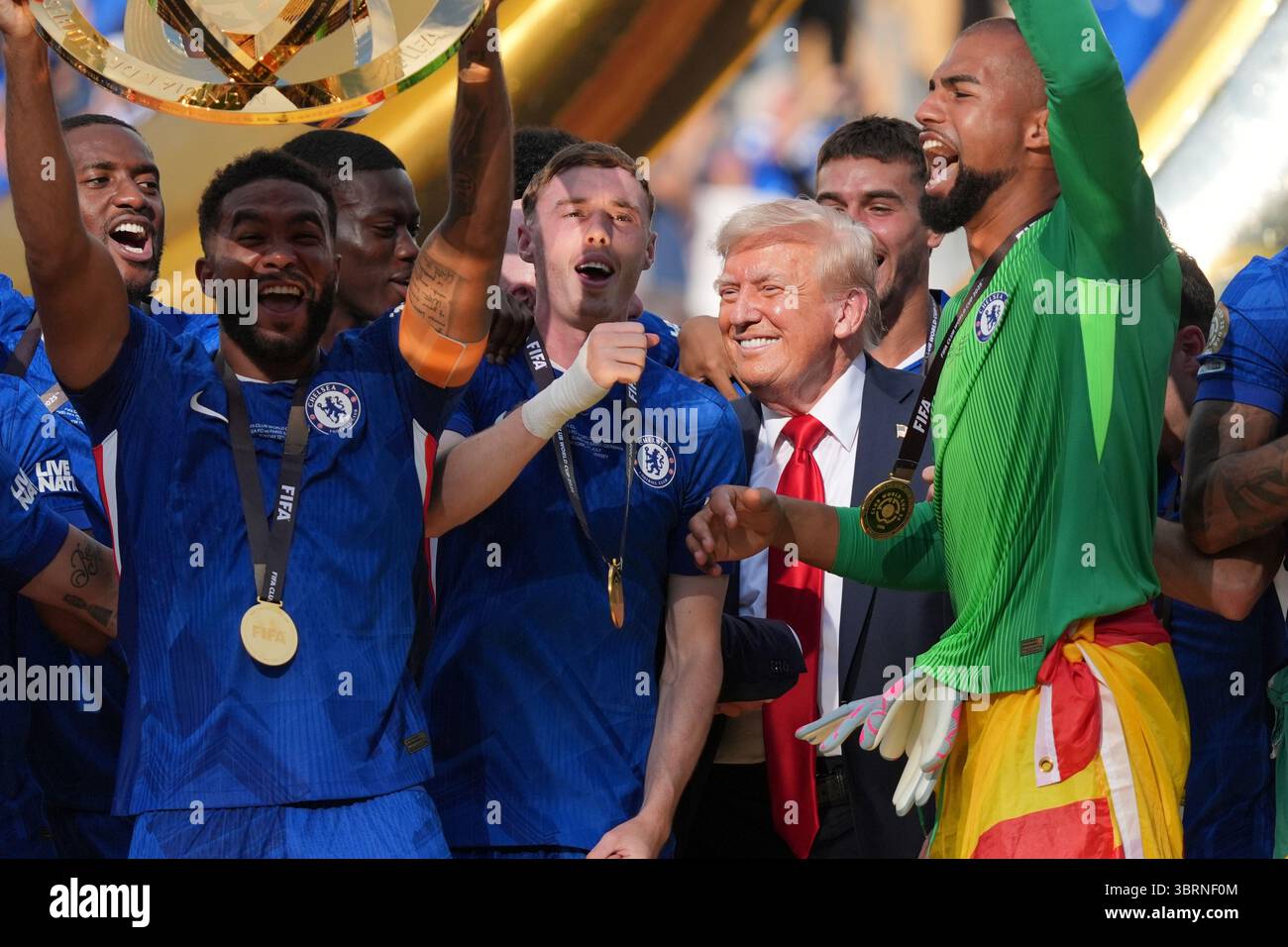 President Donald Trump, second from right, stands on stage after ...
