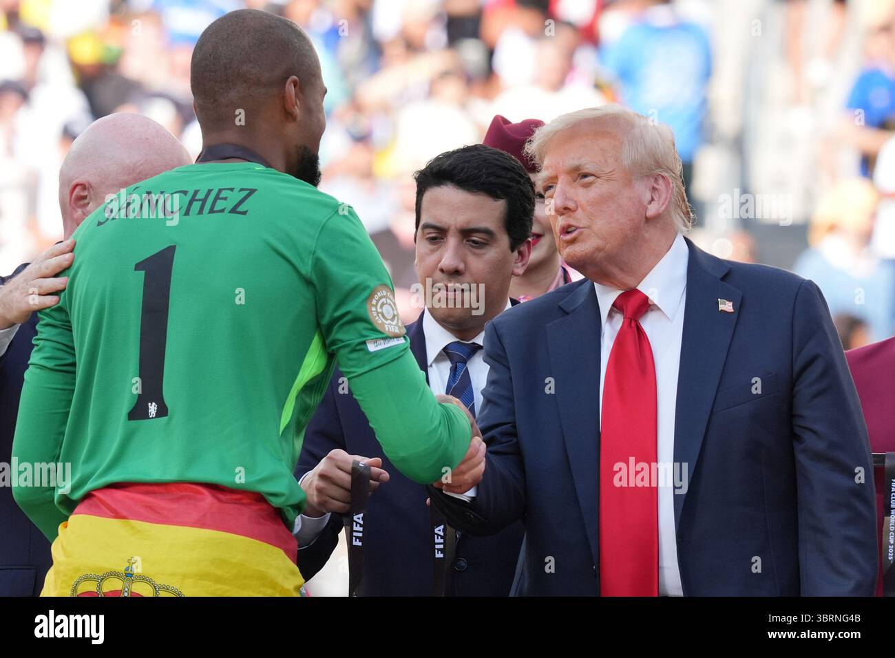 President Donald Trump, right, shakes hands with Chelsea's goalkeeper ...