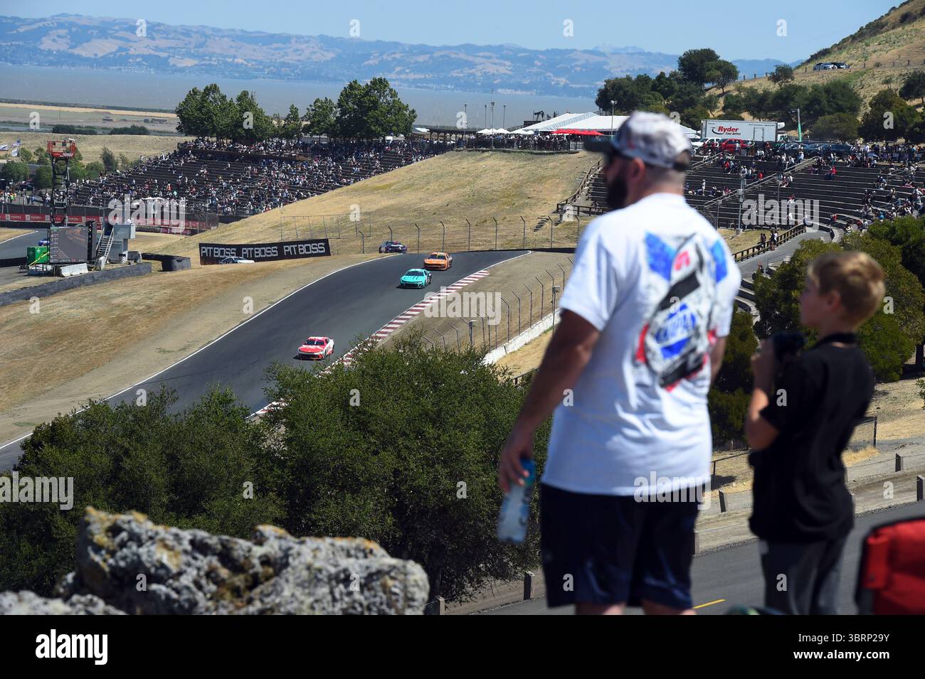 SONOMA, CA - JULY 13: Fans watch from the hillside as Shane Van ...