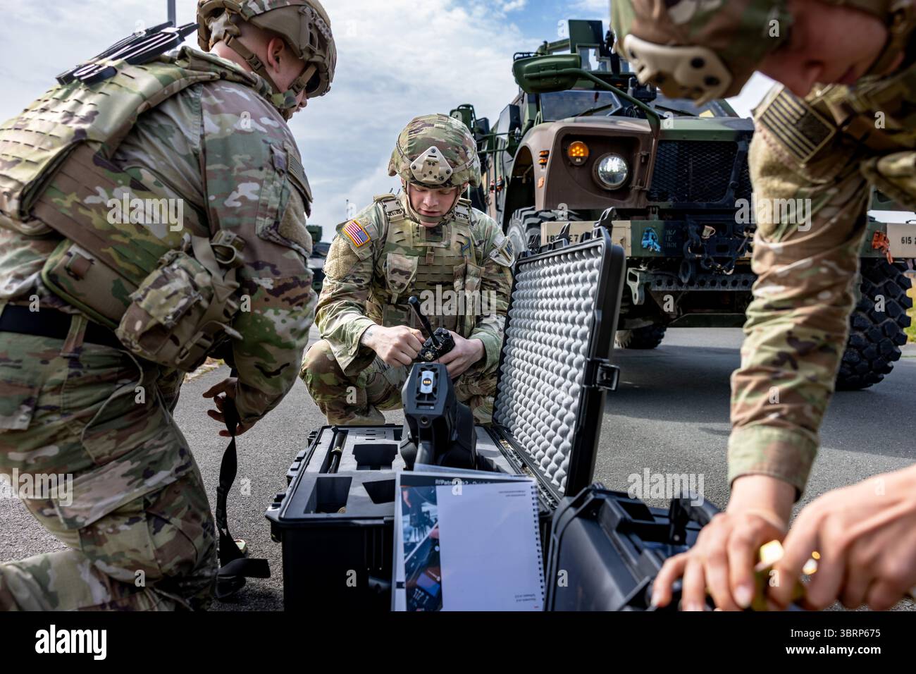 Military police officers assigned to the 615th Military Police Company ...