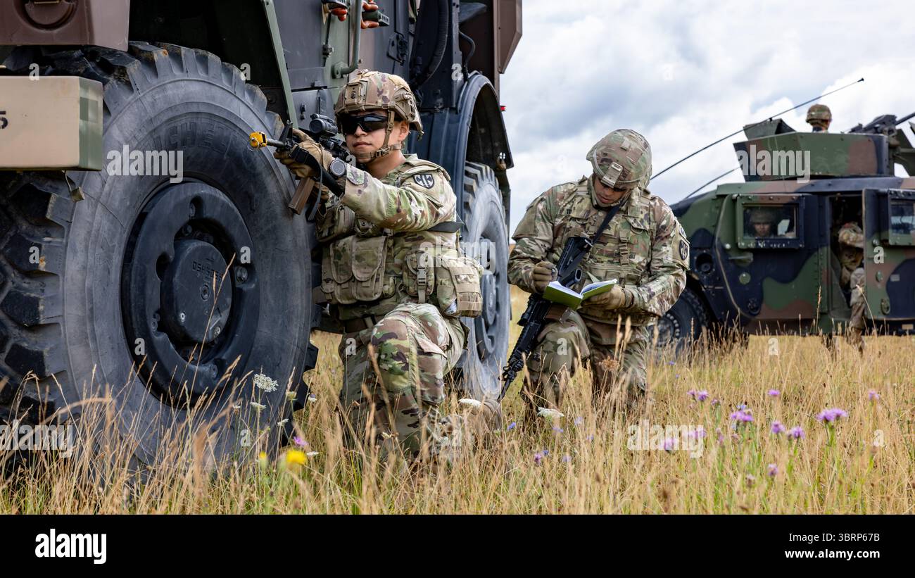 Military police officers assigned to the 615th Military Police Company ...