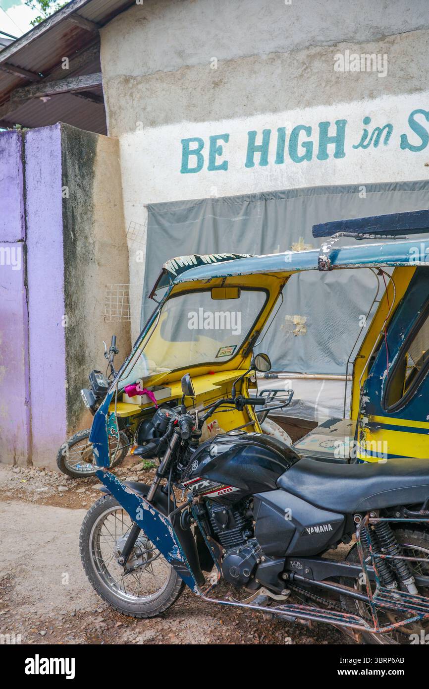 A traditional and colorful design of Filipino tricycle, a public ...