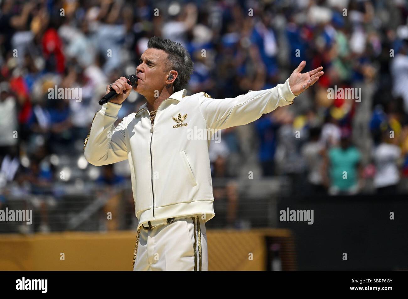 East Rutherford, USA. 13th July, 2025. Singer Robbie Williams performs ...