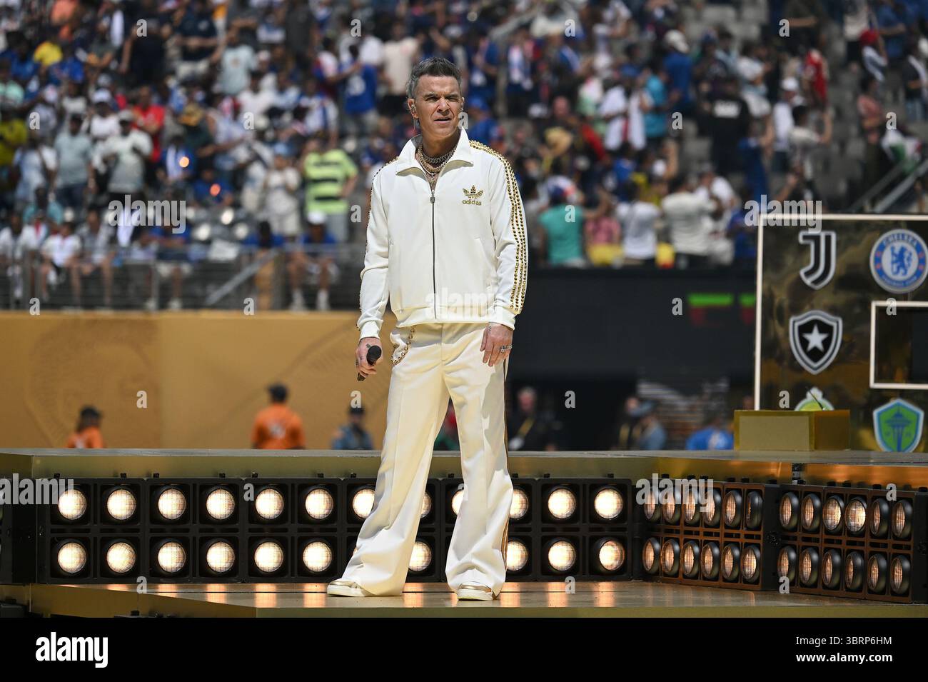 East Rutherford, USA. 13th July, 2025. Singer Robbie Williams performs ...