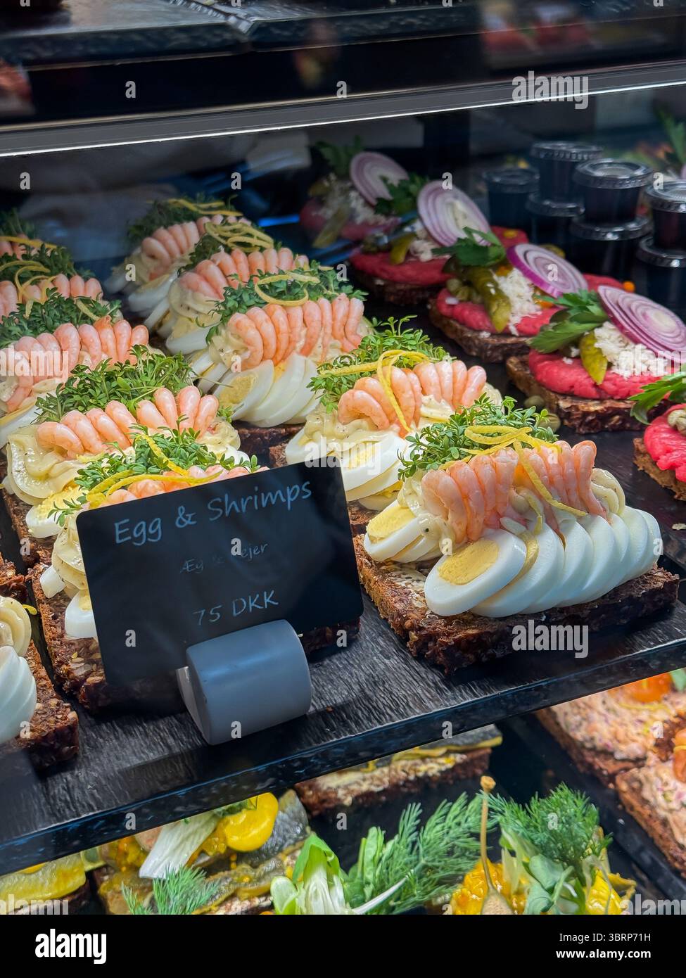 Smorrebrod traditional danish snacks assorted. Black bread with ...