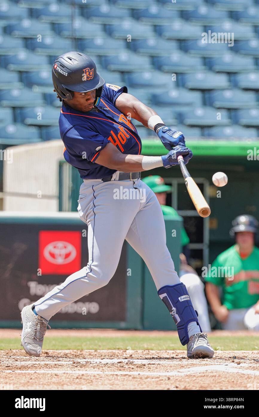 Greensboro, NC: Bowling Green Hot Rods third base Ryan Spikes (16) hits ...