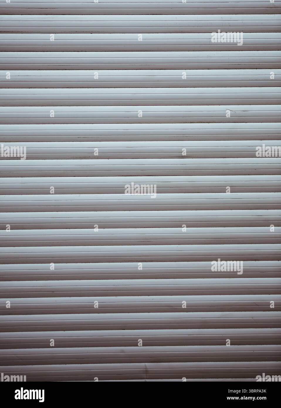 Metal roller shutter is being shown in flat design, showing grey hues ...