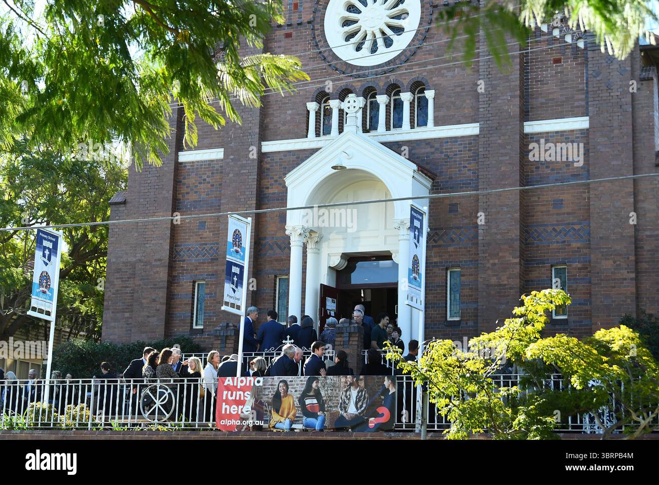 Brisbane, Australia. 14th July, 2025. Mourners are seen during a ...