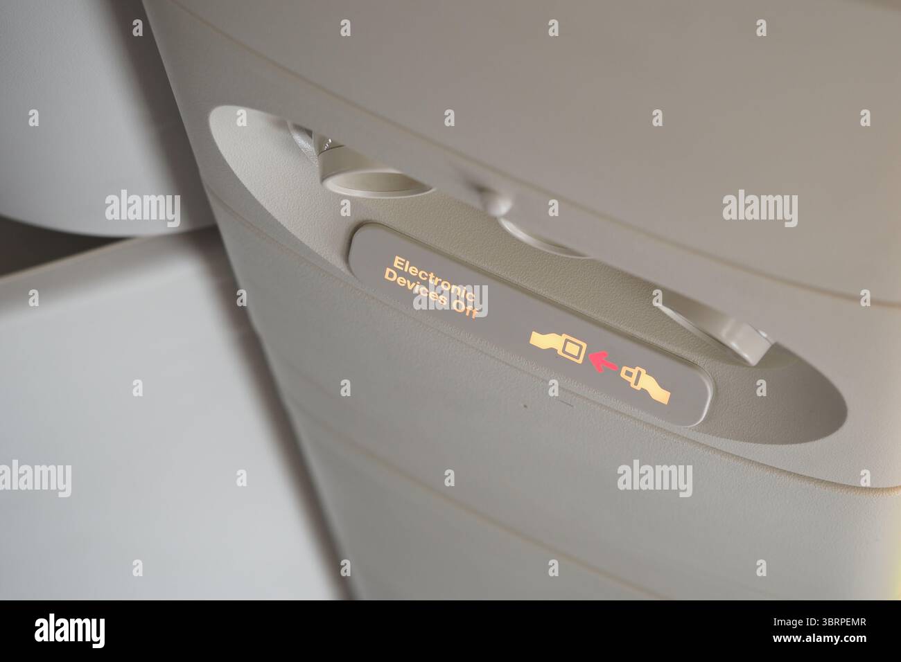 Sign indicating electronic devices off during flight Stock Photo - Alamy