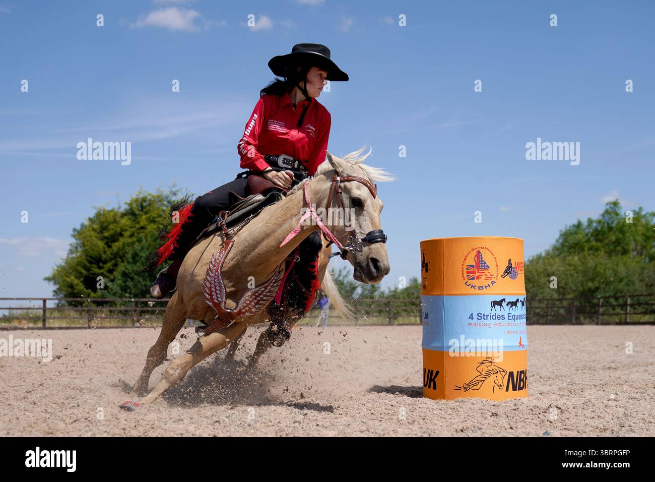 Barrel racer Eloisa Atkinson, 15, on her pony Peaches during a training ...