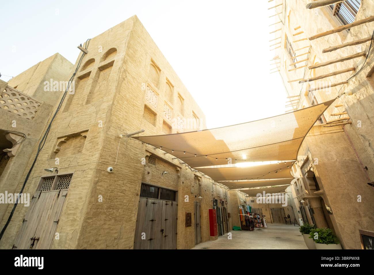 cinematic view of street market in Dubai Al seef historical ...