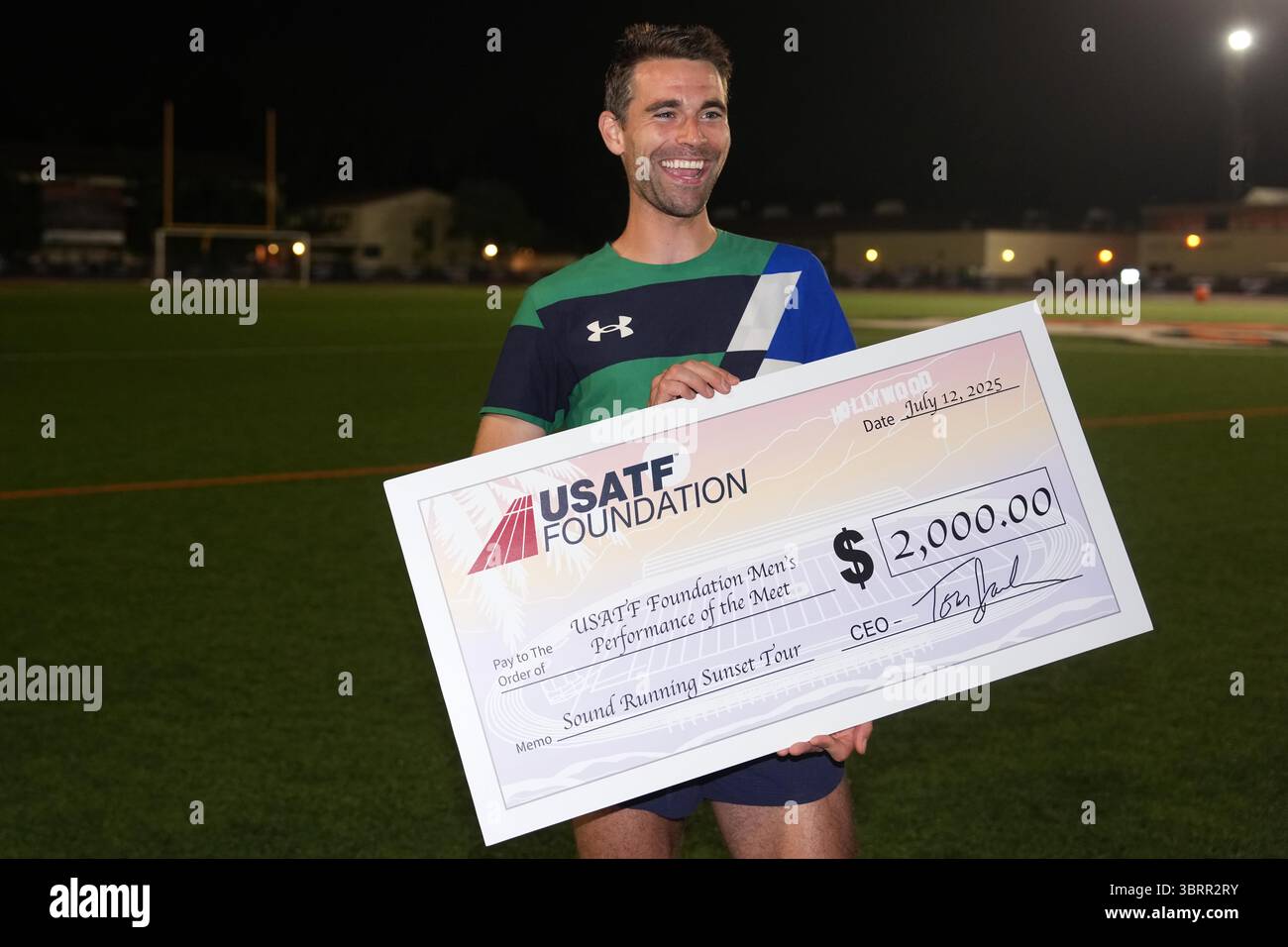 Isaac Updike (USA) poses with $2,000 check as the USATF Foundation ...