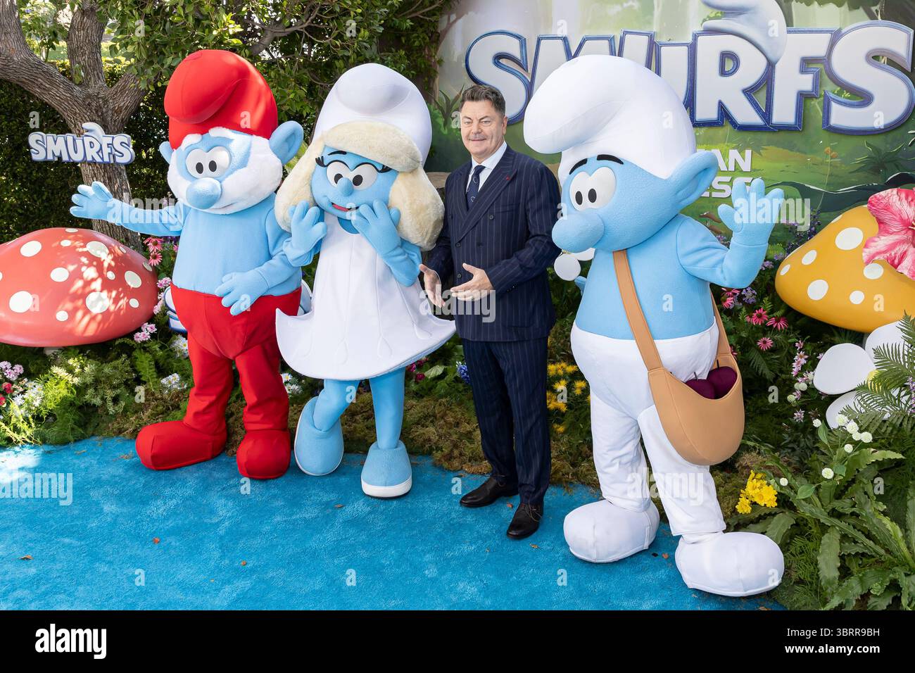 Papa Smurf, Smurfette, Nick Offerman and Smurf attend the arrivals of Paramount Pictures U.S ...