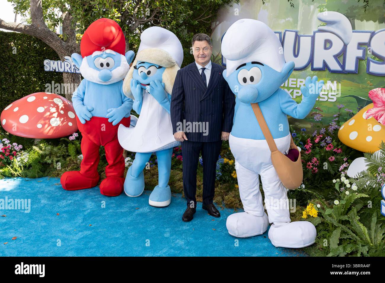 Papa Smurf, Smurfette, Nick Offerman and Smurf attend the arrivals of Paramount Pictures U.S ...