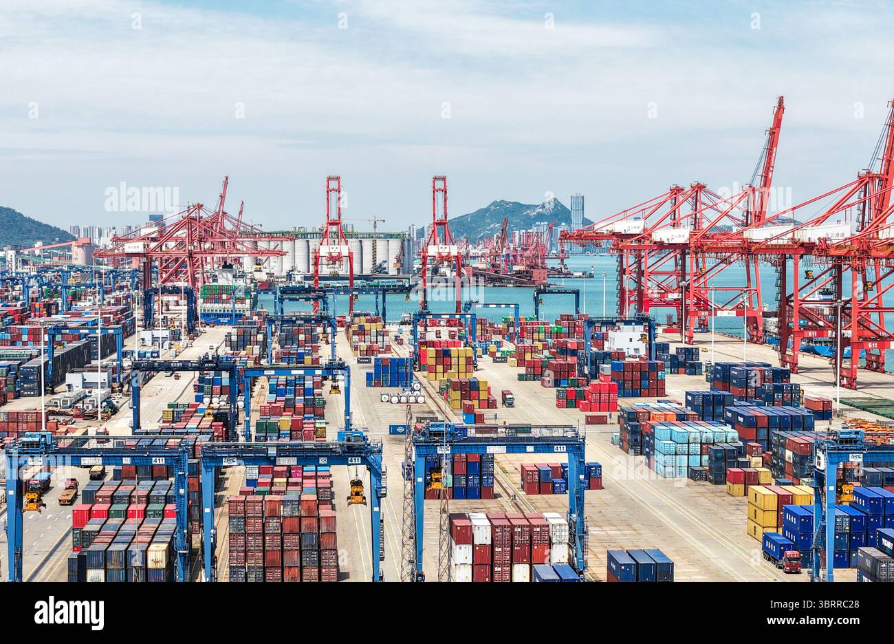 Cargo ships are loading and unloading containers at the foreign trade ...