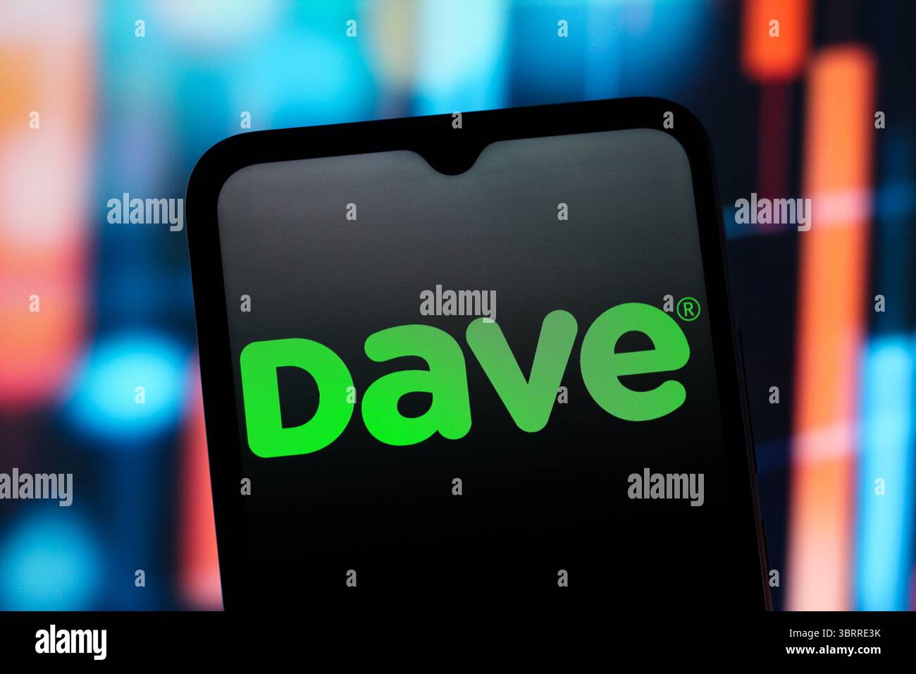 In this photo illustration, the Dave logo is seen displayed on a ...