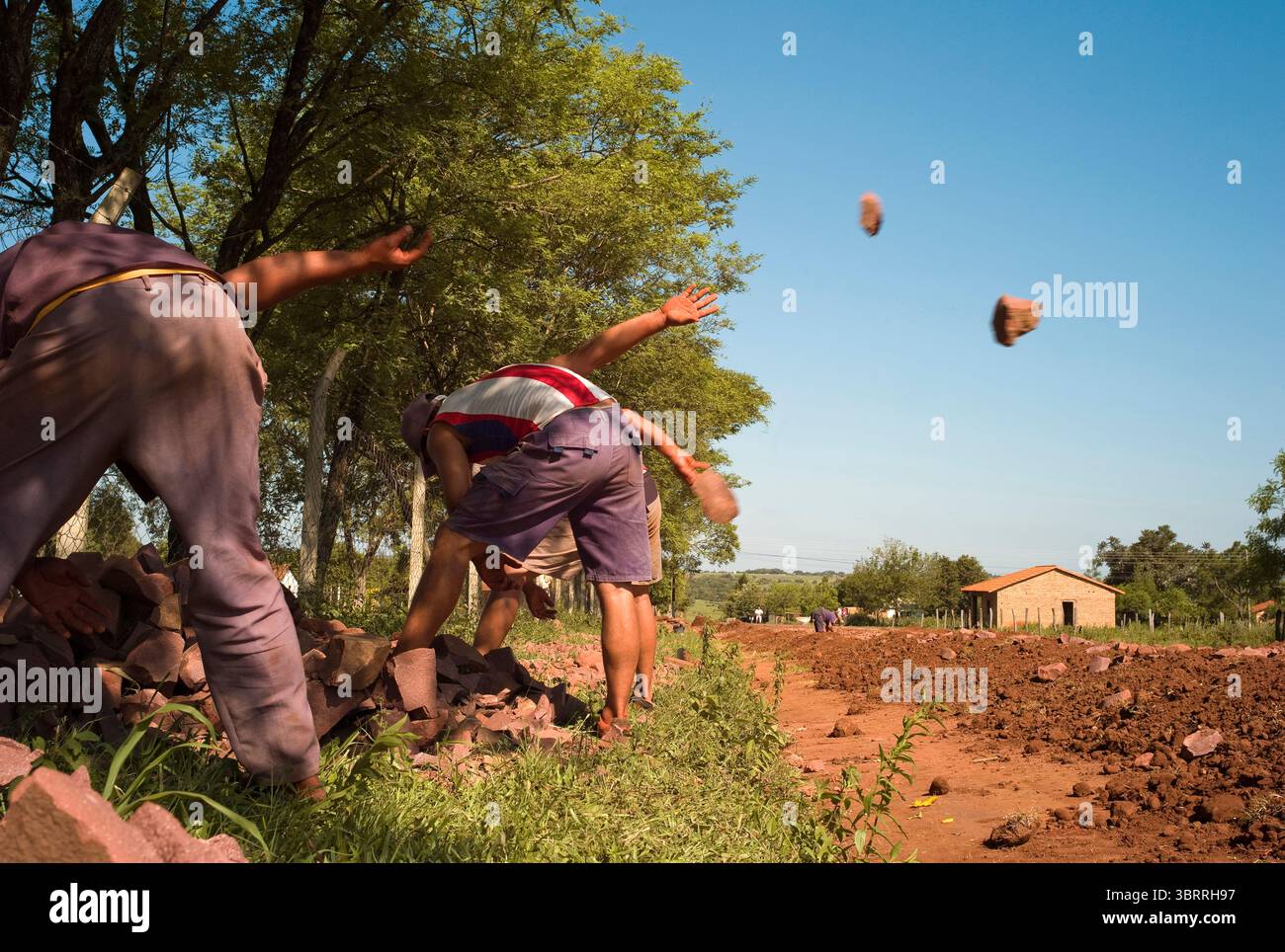 Workers cobble a street in the former mission town of Santa Maria de F ...