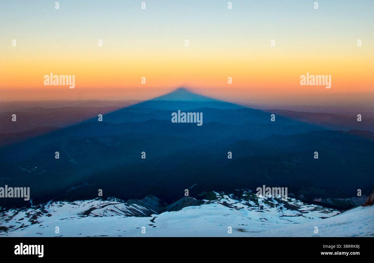 The shadow of Mount Hood stretches into the distance in Oregon Stock ...