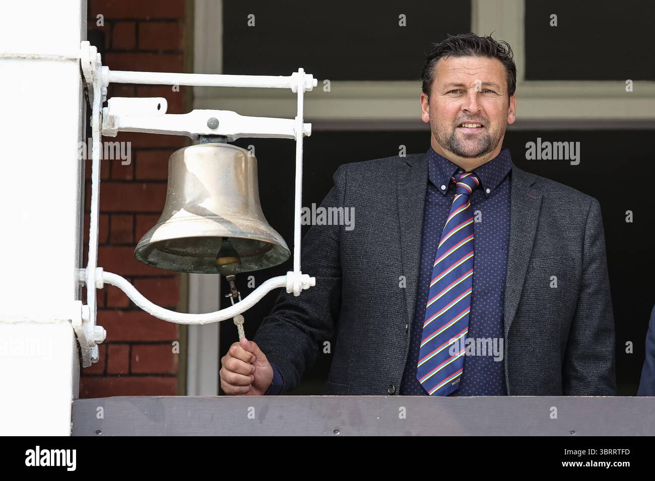 Steve Harmison rings the five minute bell during the 3rd Rothesay Test ...