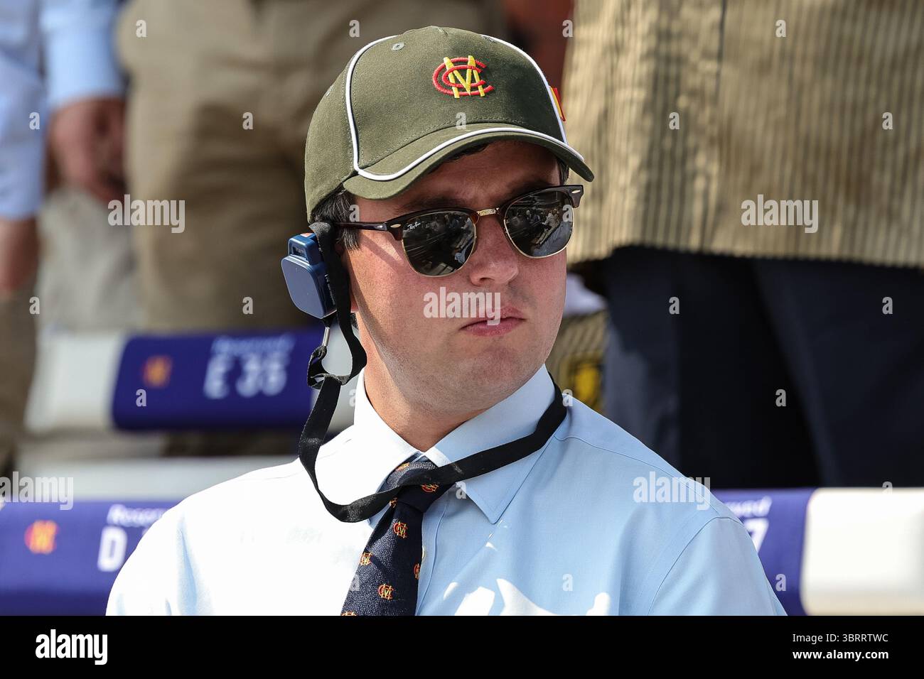 Marylebone Cricket Club members sit in the sun in the Lords Pavilion ...