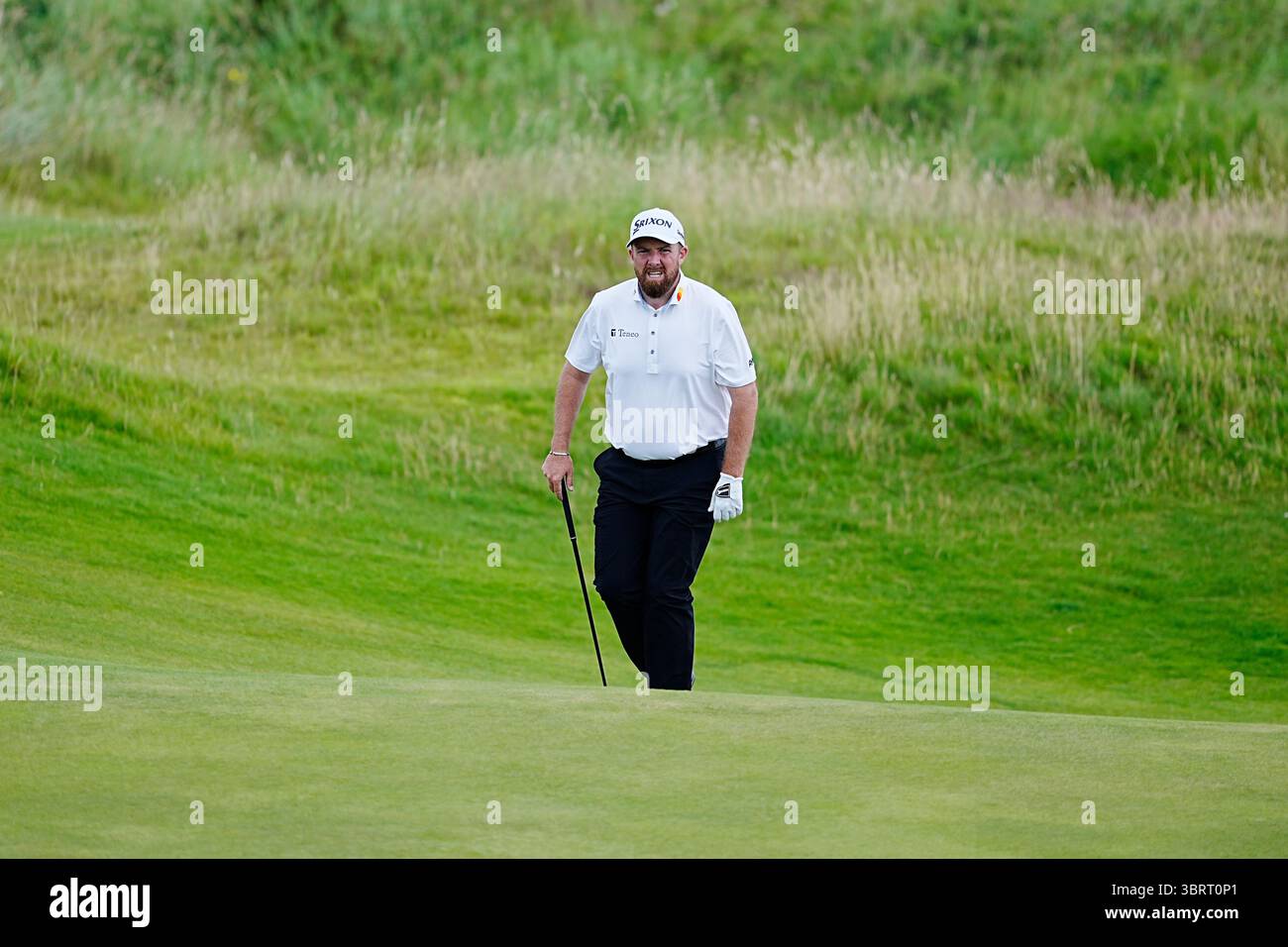 Ireland's Shane Lowry plays on the 9th fairway during the second ...