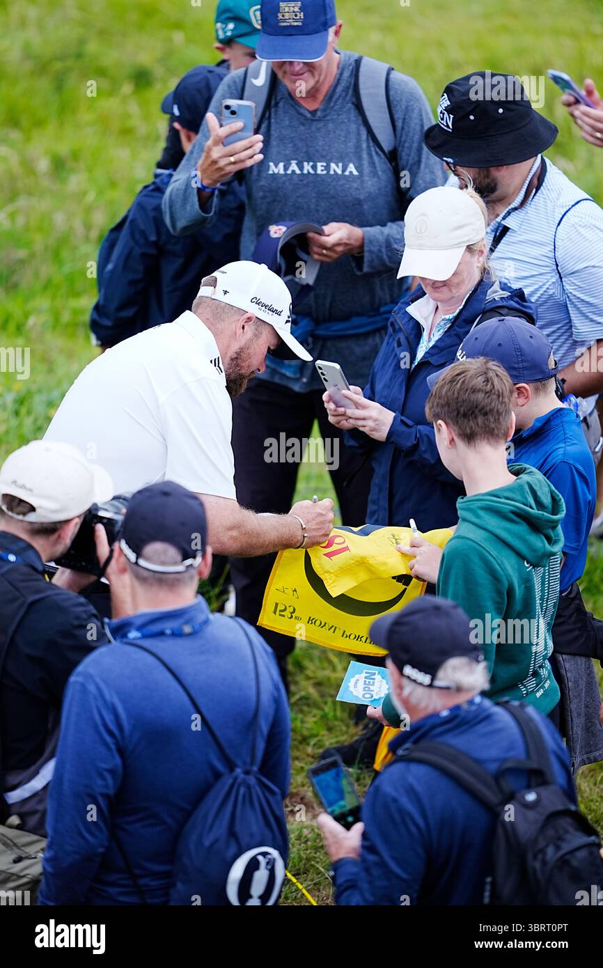 Ireland's Shane Lowry signs autographs for the spectators during the ...