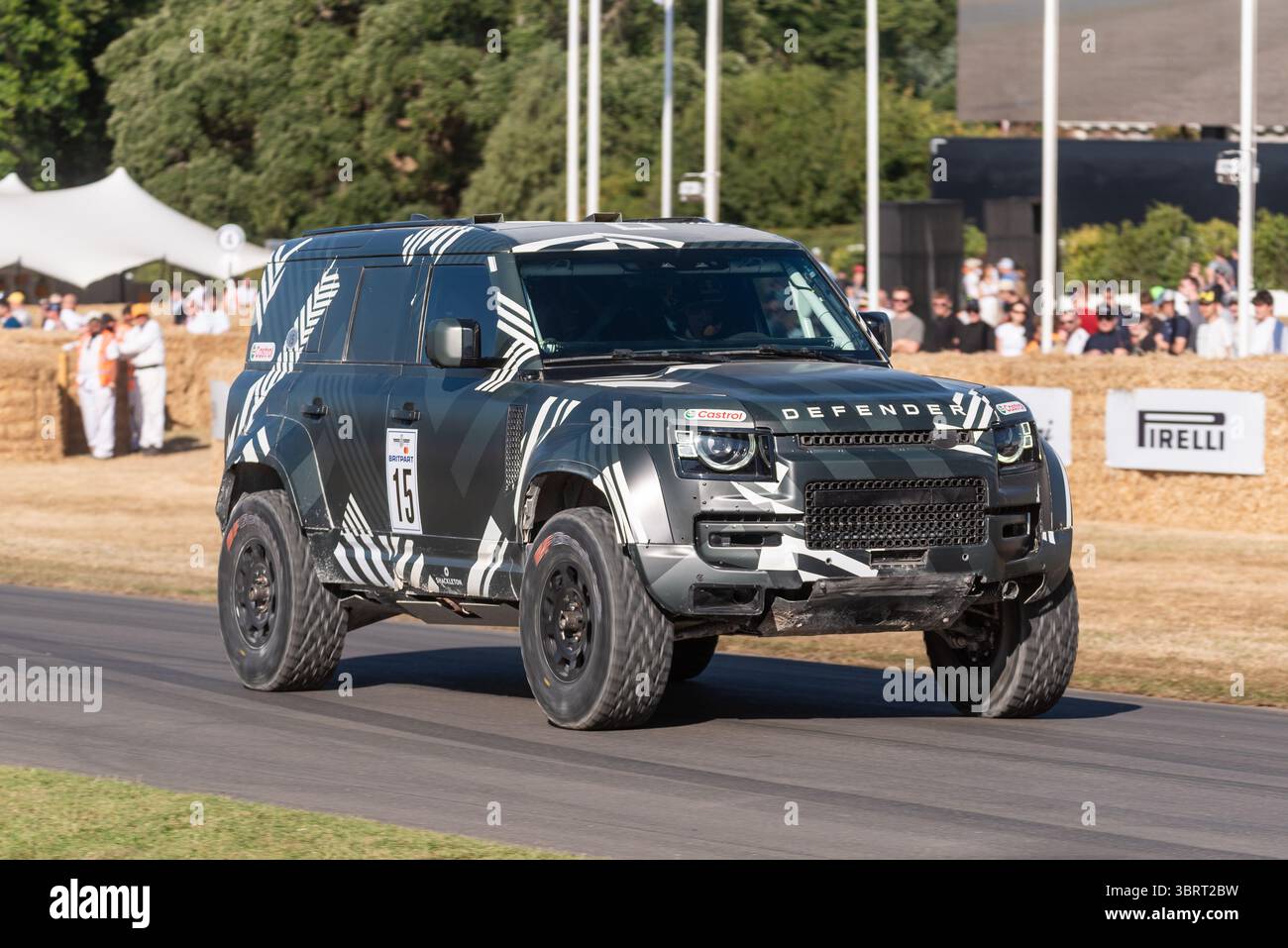 Land Rover Defender Dakar D7X-R Prototype driving up the hill climb ...