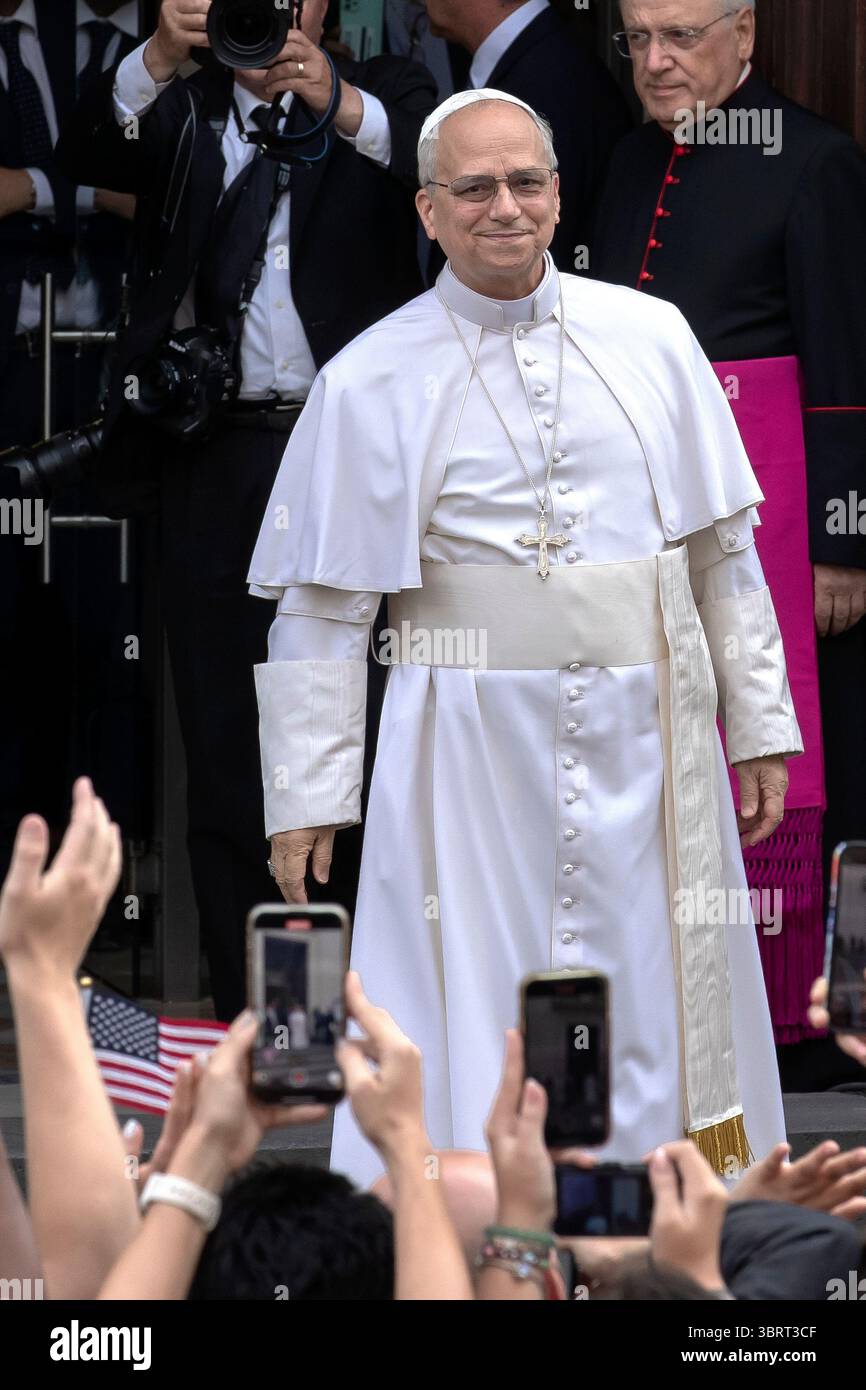 Pope Leo XIV greets the faithful upon his arrival to celebrate Mass ...