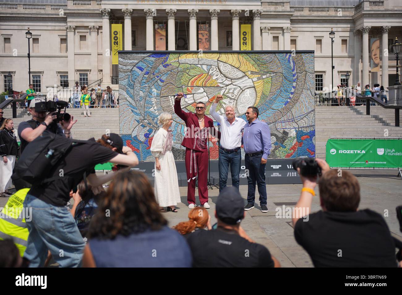 World Heavyweight Champion boxer Oleksandr Usyk and Sir Richard Branson ...