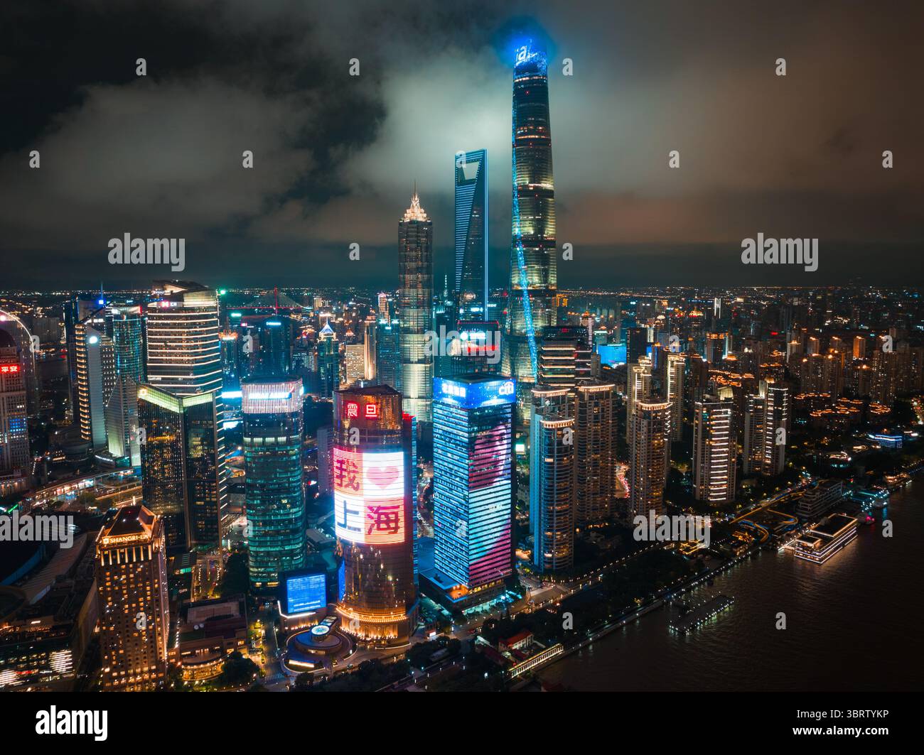 Shanghai, China - 21 June 2025: Aerial view of the Bund's luminous ...