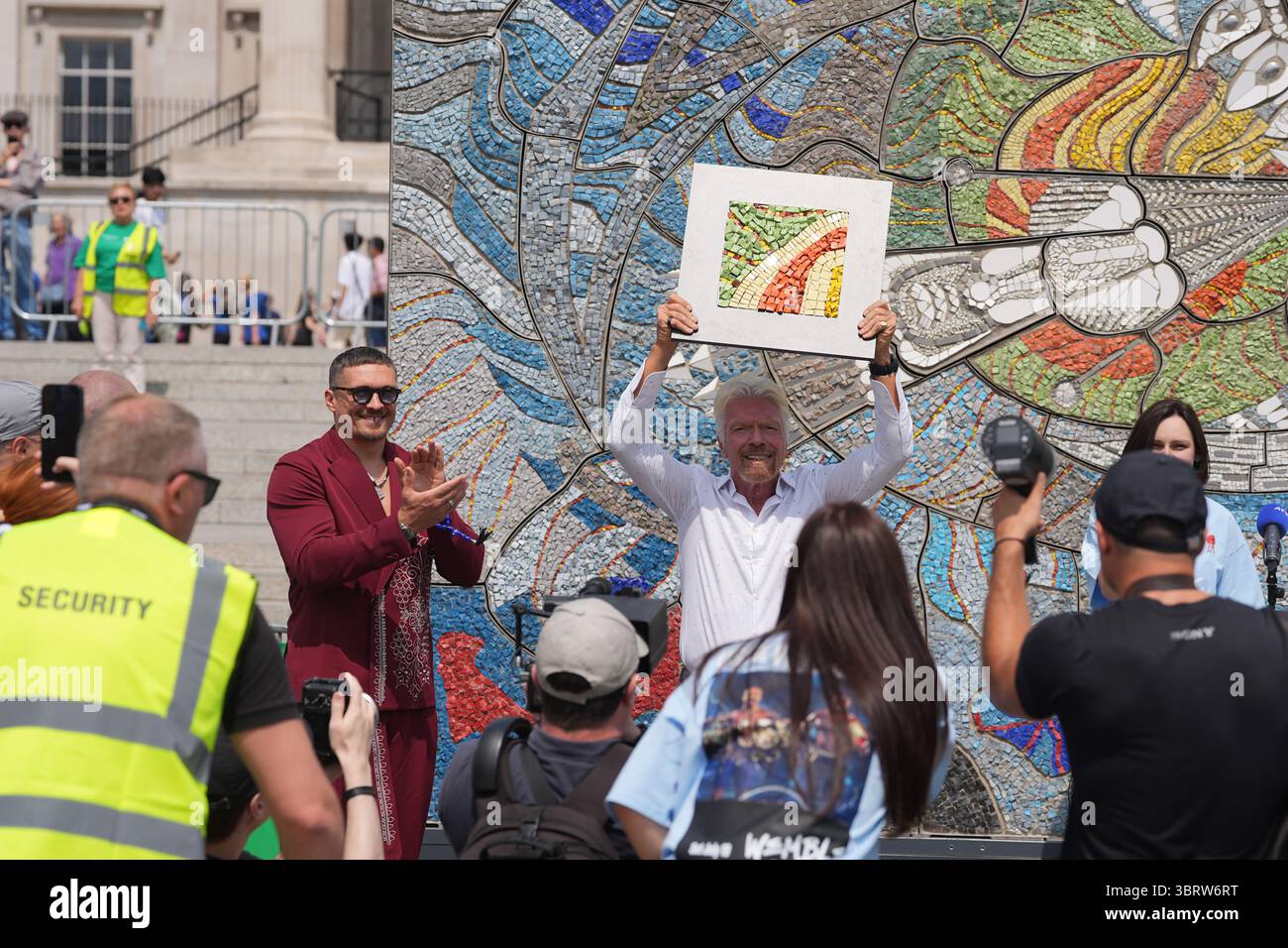 World Heavyweight Champion boxer Oleksandr Usyk and Sir Richard Branson ...