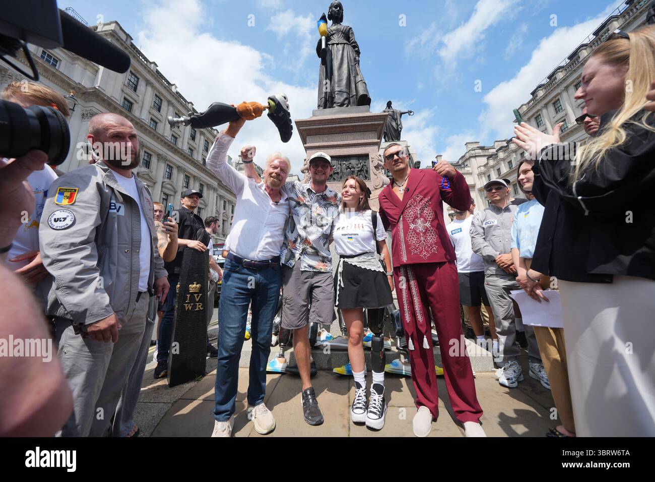 World Heavyweight Champion boxer Oleksandr Usyk and Sir Richard Branson ...
