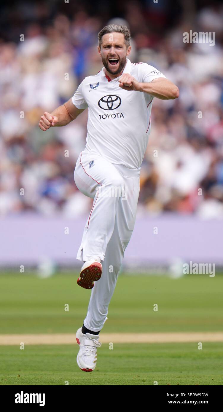 England's Chris Woakes celebrates taking the wicket of India's Nitish ...