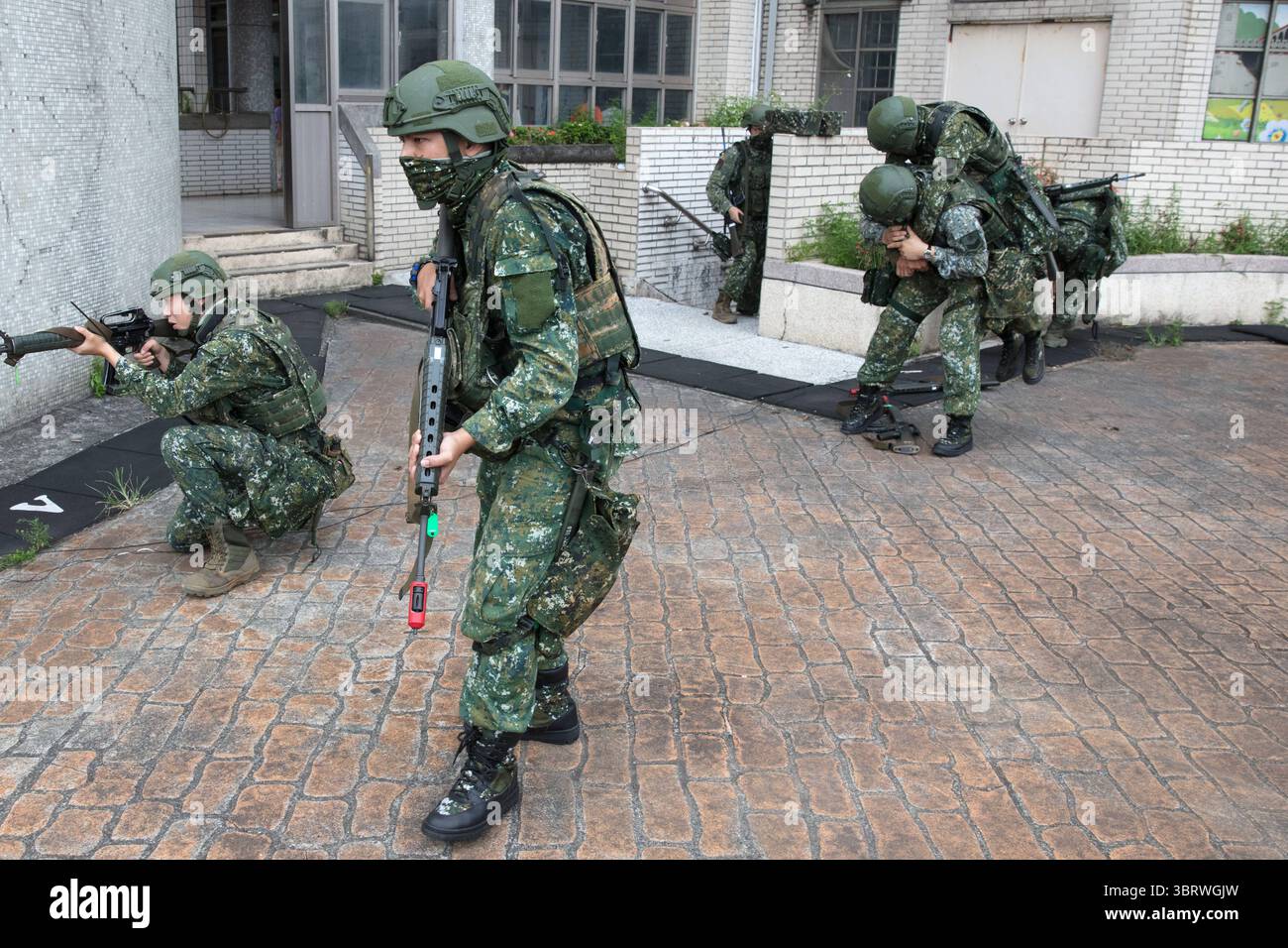 Reservists take part in training at an elementary school during the ...