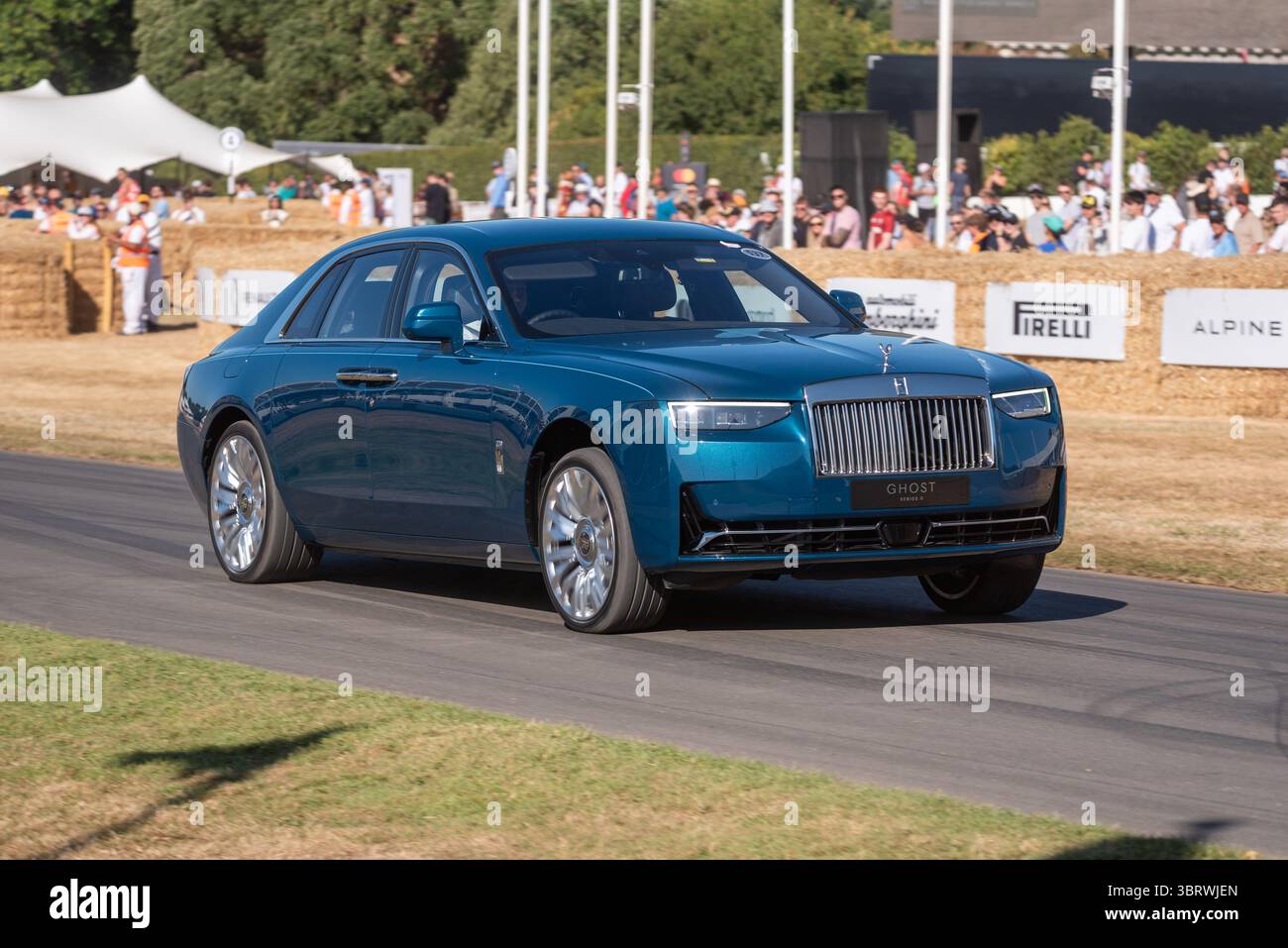 Rolls Royce Ghost Series II luxury car driving up the hill climb track ...