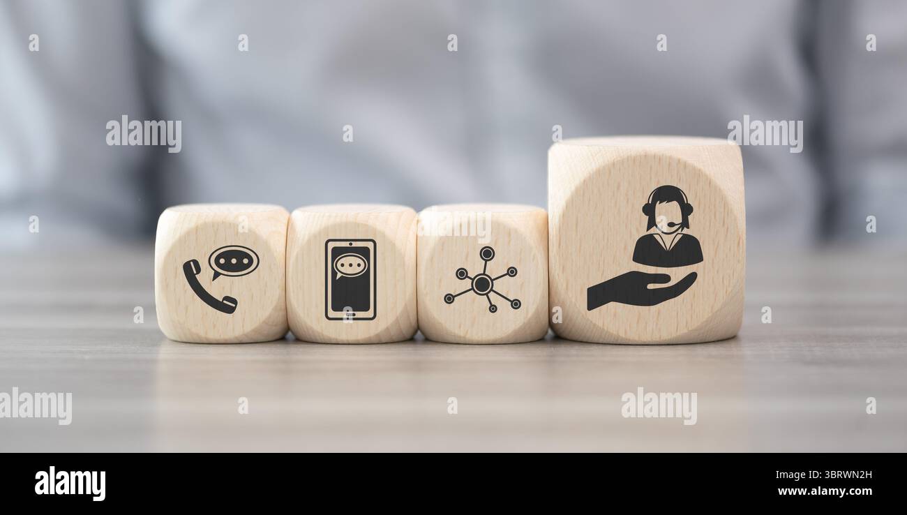 Wooden blocks with symbol of customer service concept Stock Photo - Alamy