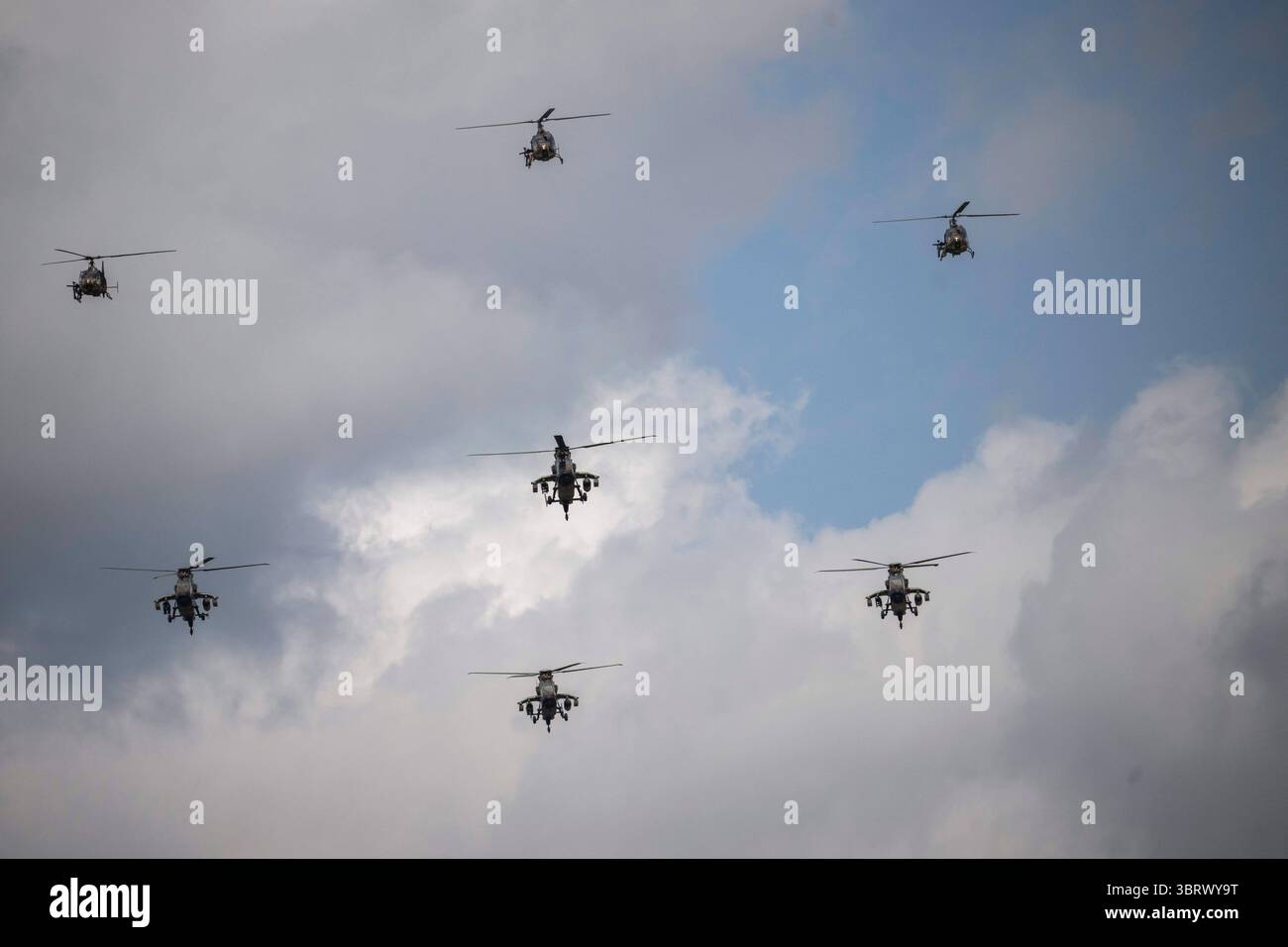 French Air and Space Army helicopters perform a fly-over during the ...
