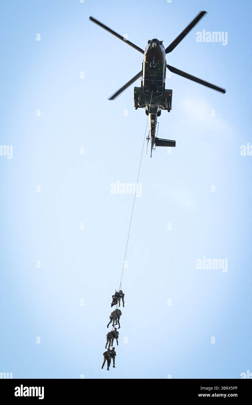French military units prepare themselves for the Bastille Day military ...